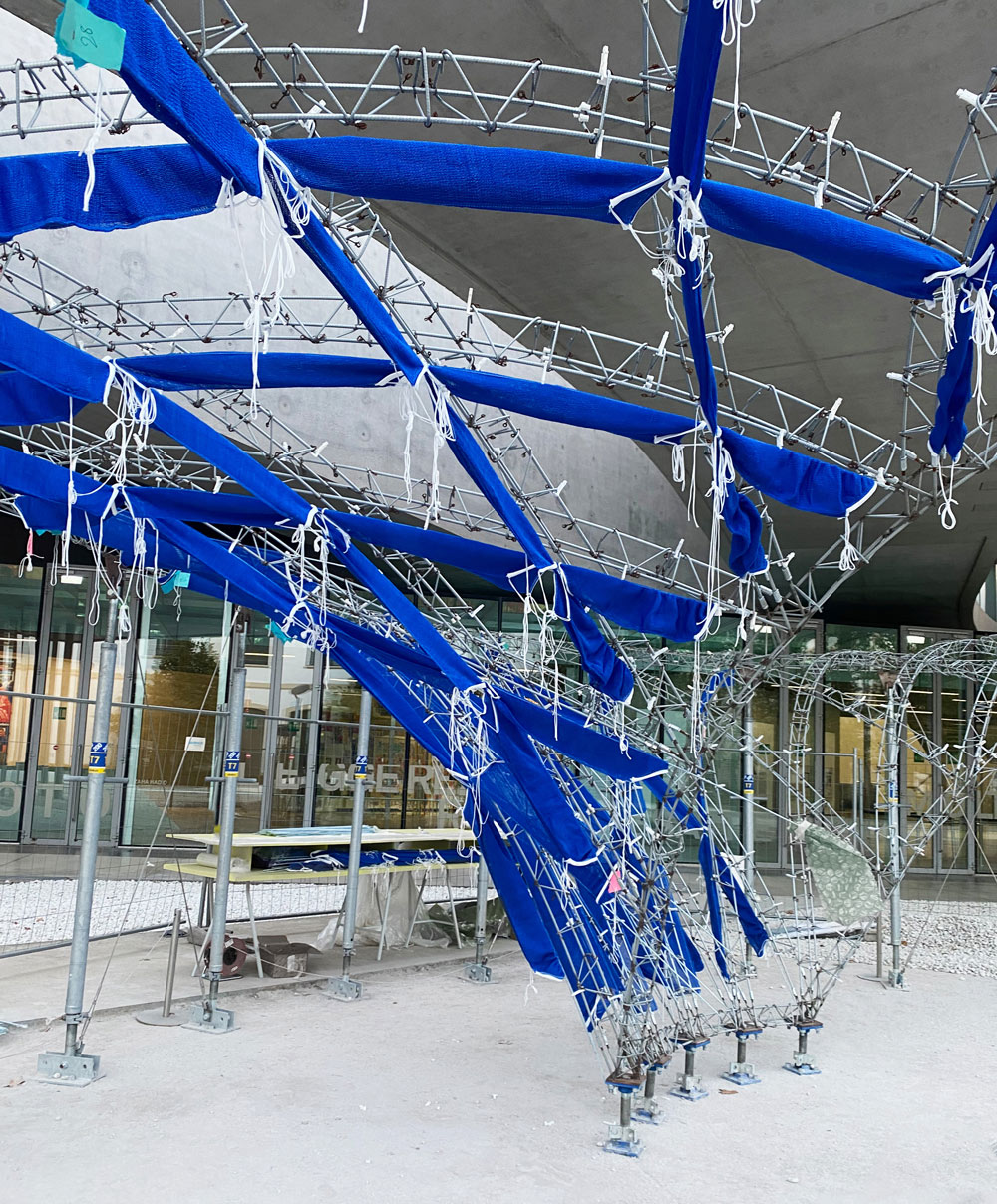 KnitNervi - An actively bent, knitted formwork for ribbed concrete shells