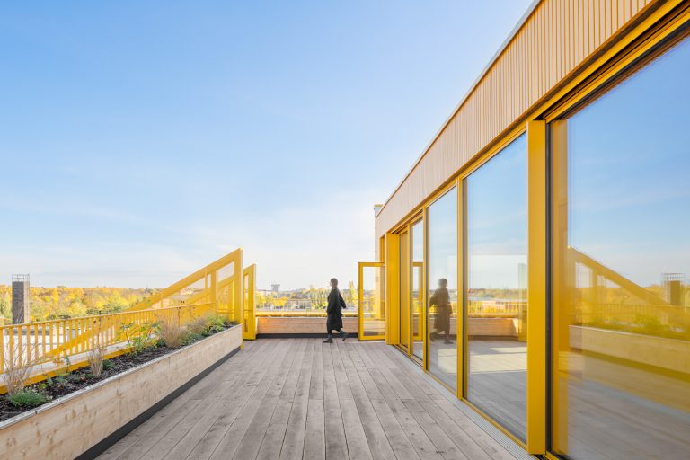 MVRDV transforms Atelier Gardens Berlin with yellow staircase
